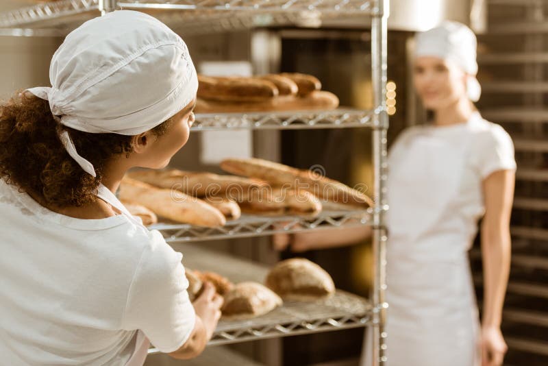 Female Bakers Working Together at Baking Manufacture Stock Image ...