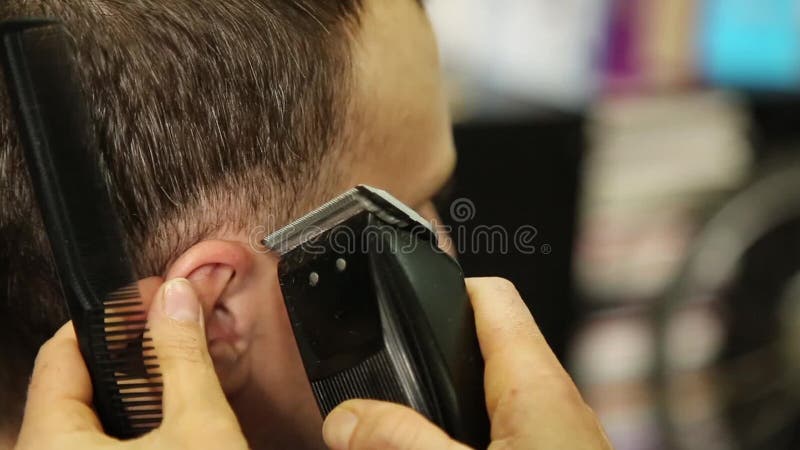 Female Barber Using a Clipper To Cut a Mans Hair Stock Footage - Video ...
