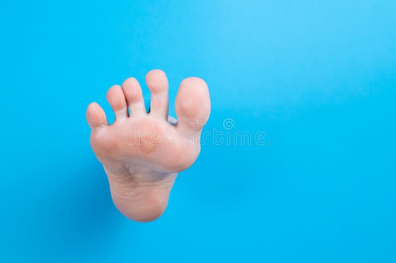 Female Bare Foot on a Blue Background. Stock Photo - Image of blue ...