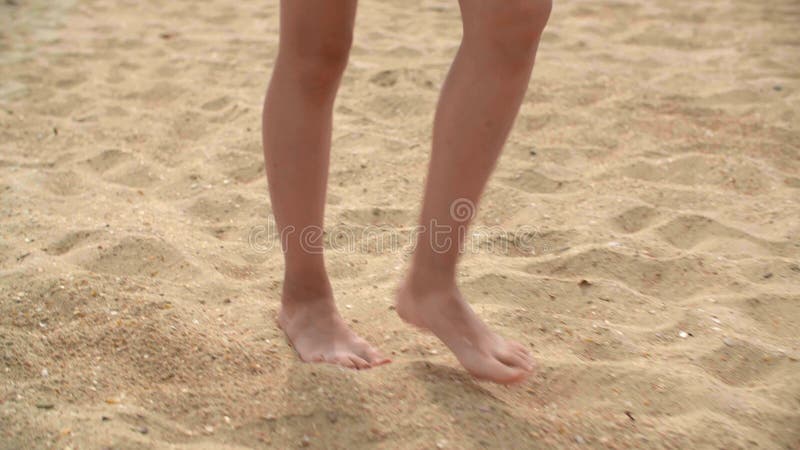 Female Barefoot Feet Walking On Sand On Summer Beach Close Up Barefoot