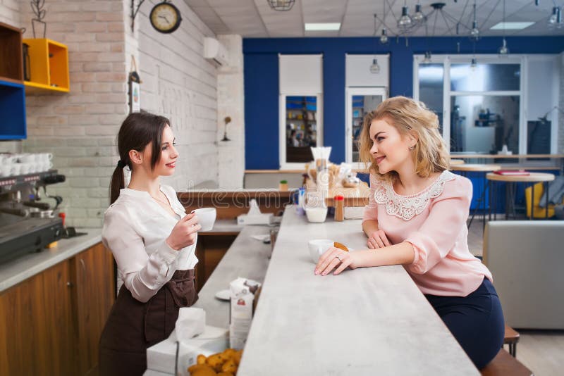 Female Barista and the Customer in a Cafe Stock Image - Image of ...