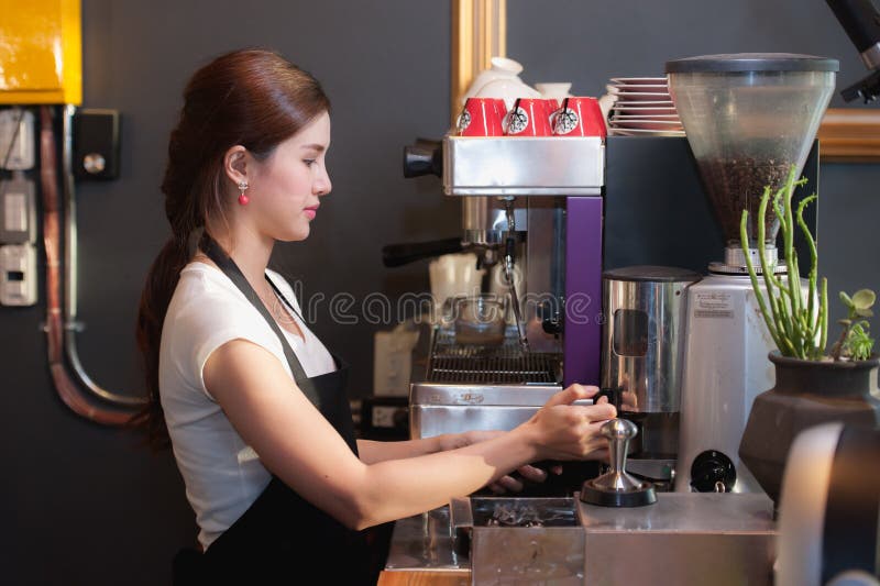 Female Bartender Makes Coffee Using Coffee Machine. Stock Photo - Image ...