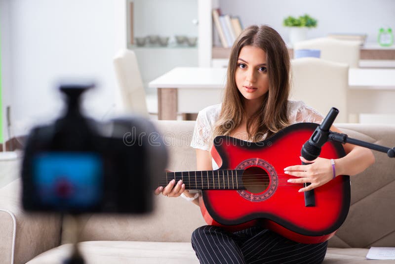 Female Beautiful Blogger Playing Guitar Stock Photo - Image of blogger ...