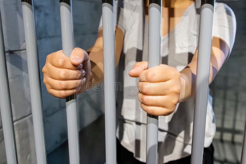 398 Female Prisoner Behind Bars Stock Photos - Free & Royalty-Free ...