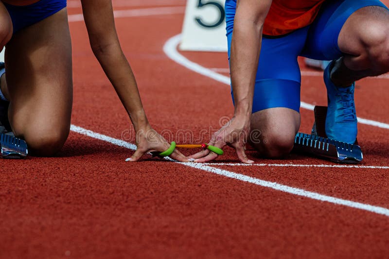 Female Blind Para Athlete Runner with Male Guide in Starting Blocks ... Female Blind Para Athlete Runner with Male Guide in Starting Blocks ...