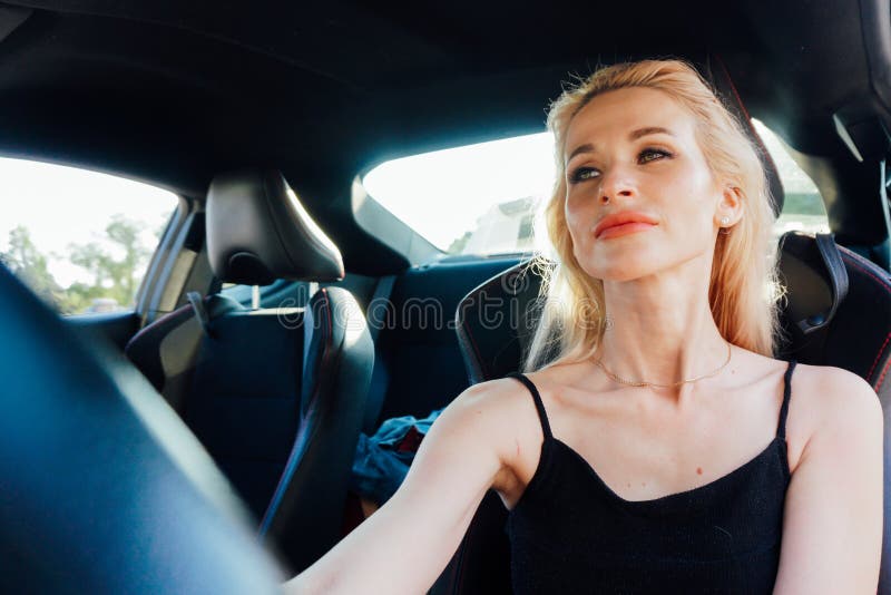 Beautiful Female Blonde Driver Behind the Wheel of a Car Stock Photo ...