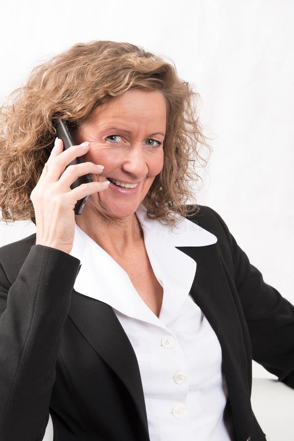 Female Boss Talking To Someone On The Phone Stock Image - Image of ...