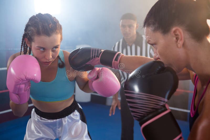Female Boxers Fighting in Ring Stock Photo - Image of exercising ...