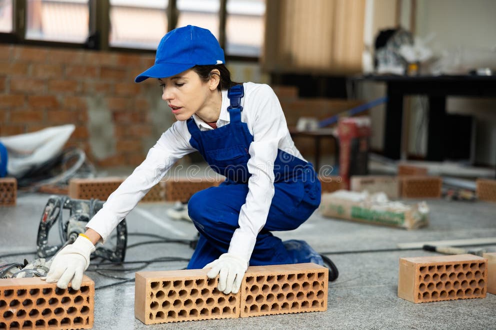 Female Builder Preparing Bricks for Erection of Partition Wall Stock Image - Image of business ...