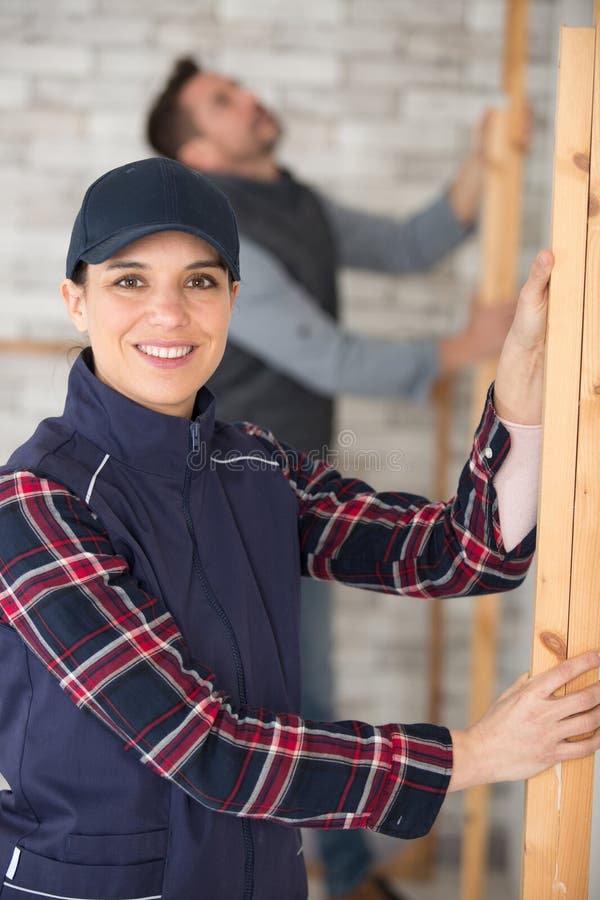 Female Builder Carrying Wood on Site Stock Photo - Image of horizontal ...