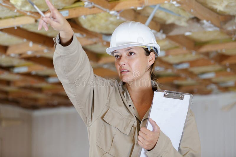 Female Builder Pointing Up for Something Stock Photo - Image of female ...