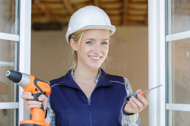 Female Builder Showing Choice Tools Stock Photo - Image of handle ...