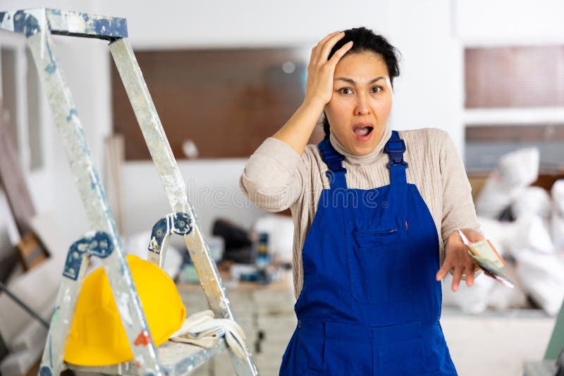 Female Builder is Unhappy with the Money Received for Work Done Stock ...
