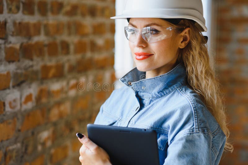 Female Builder at Work on Site Stock Image - Image of outdoors, builder ...