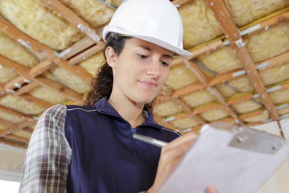 Female Builder Writing on Clipboard Stock Photo - Image of crafts ...