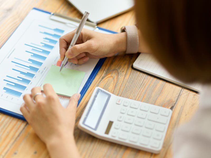 Female Business Worker Taking Notes in Notepad or Sticky Note Stock ...