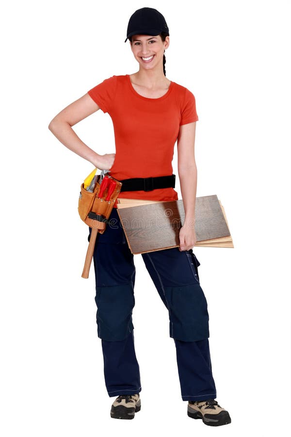A female carpenter sawing. stock image. Image of girl - 33672977