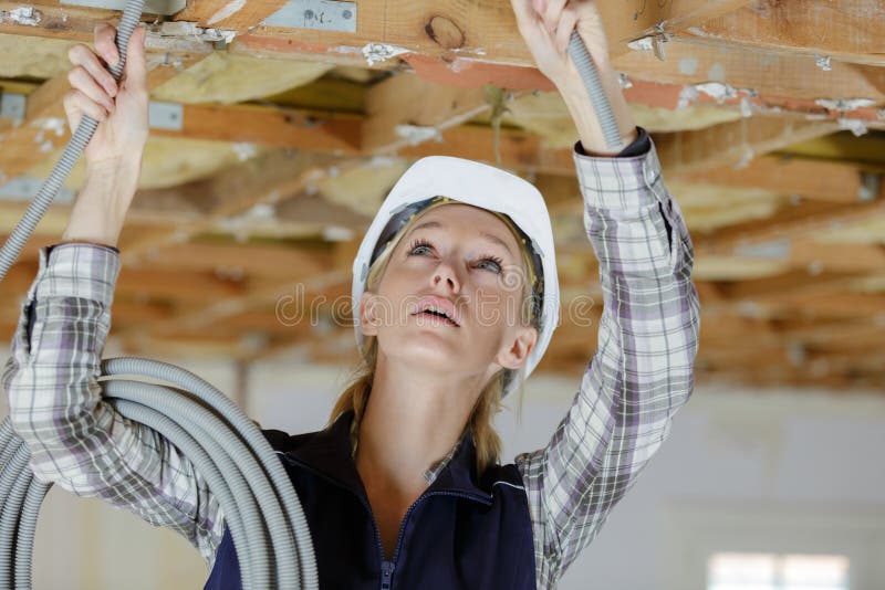 Female Carpenter at Construction Site Stock Photo - Image of expertise ...