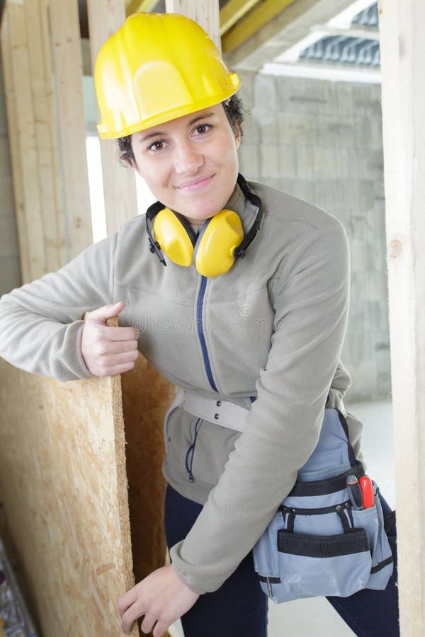 Female Carpenter at Construction Site Stock Image - Image of framing ...