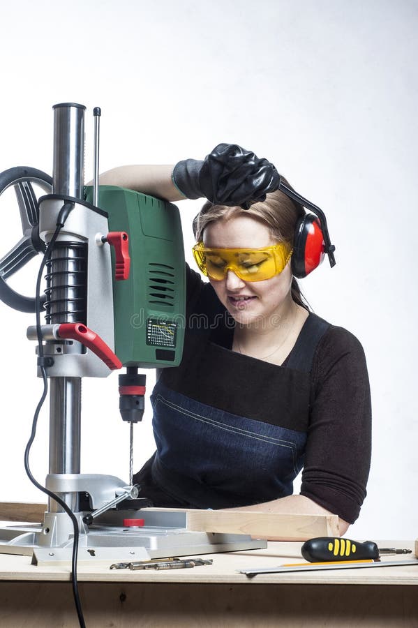 Female Carpenter and Drilling Machine. Stock Image - Image of industry ...