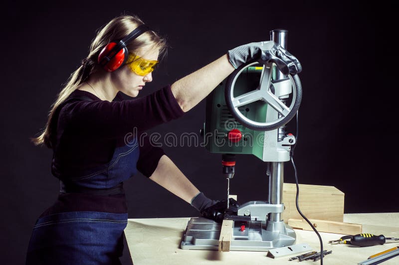 Female Carpenter and Drilling Machine. Stock Image - Image of beautiful ...
