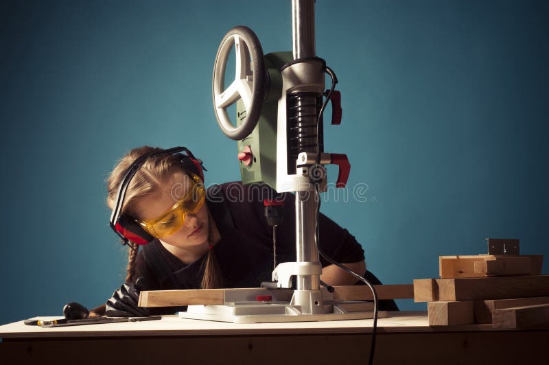 Female Carpenter and Drilling Machine. Stock Photo - Image of industry ...