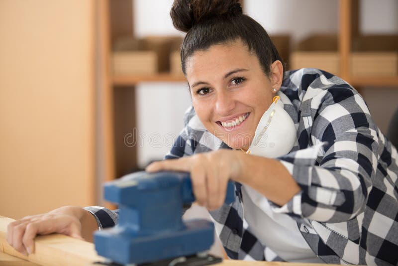 Female Carpenter Sanding Wood Stock Image - Image of carpentry, person ...