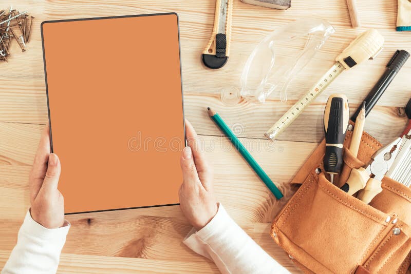 Female Carpenter Using Digital Tablet Computer, Mock Up Screen Stock ...