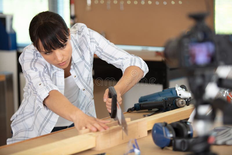 Female Carpenter Using Electric Sander for Wood Stock Image - Image of ...