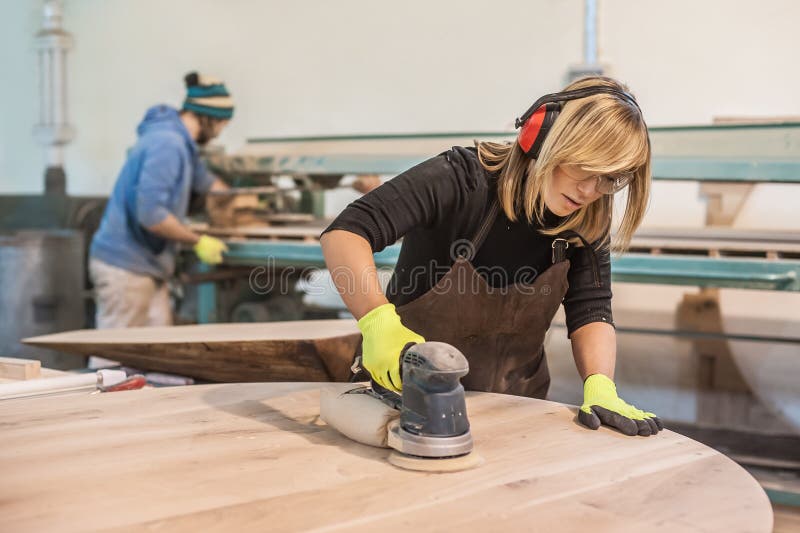 Female Carpenter Using Electric Sander Stock Photo - Image of pidgin ...