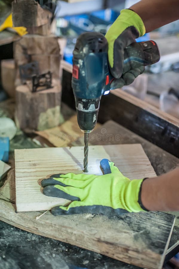 Female Carpenter Using Power Drill Stock Photo - Image of fixing ...