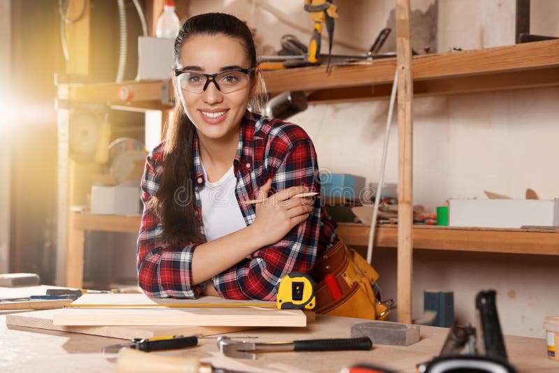 Female Carpenter with Boards in Workshop Stock Photo - Image of ...