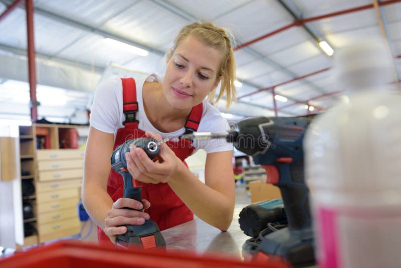 Female Carpenter Woodworking Stock Photo - Image of checking, helmet ...