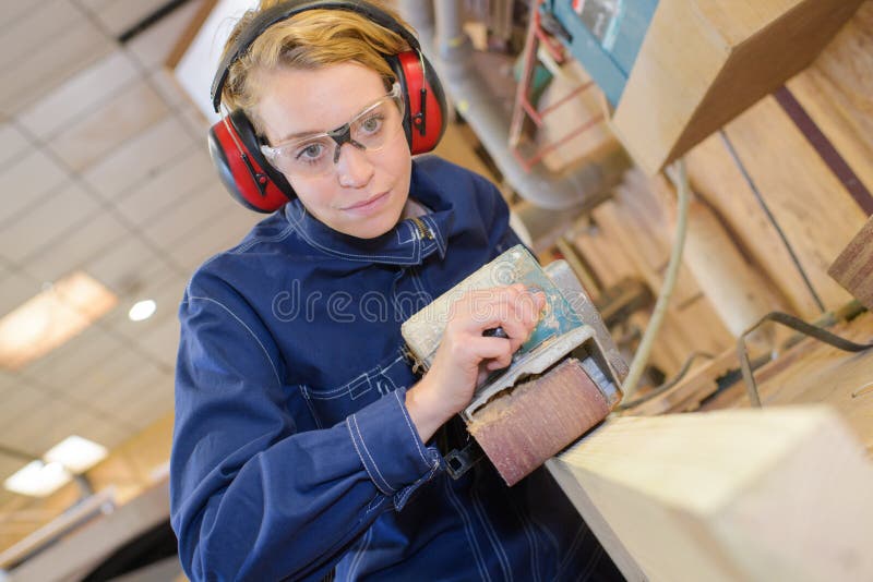 Female carpenter at work stock photo. Image of build - 128023492