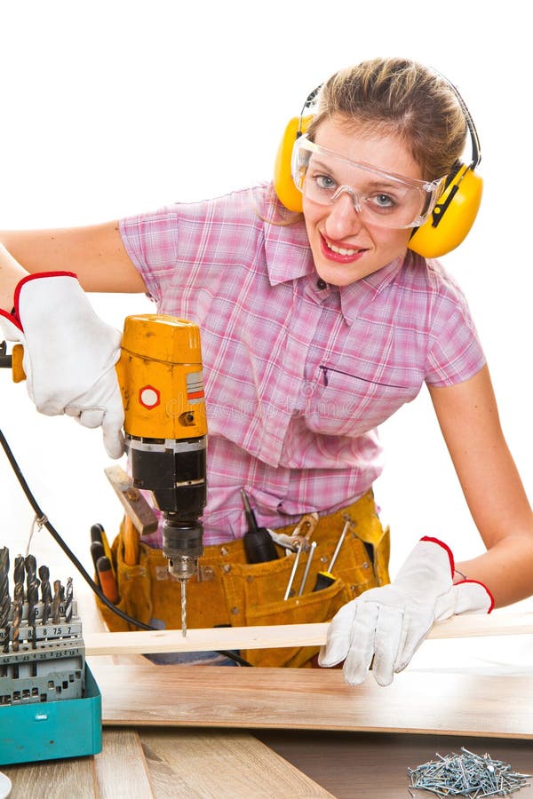 Female Carpenter at Work Using Hand Drilling Machine Stock Image ...