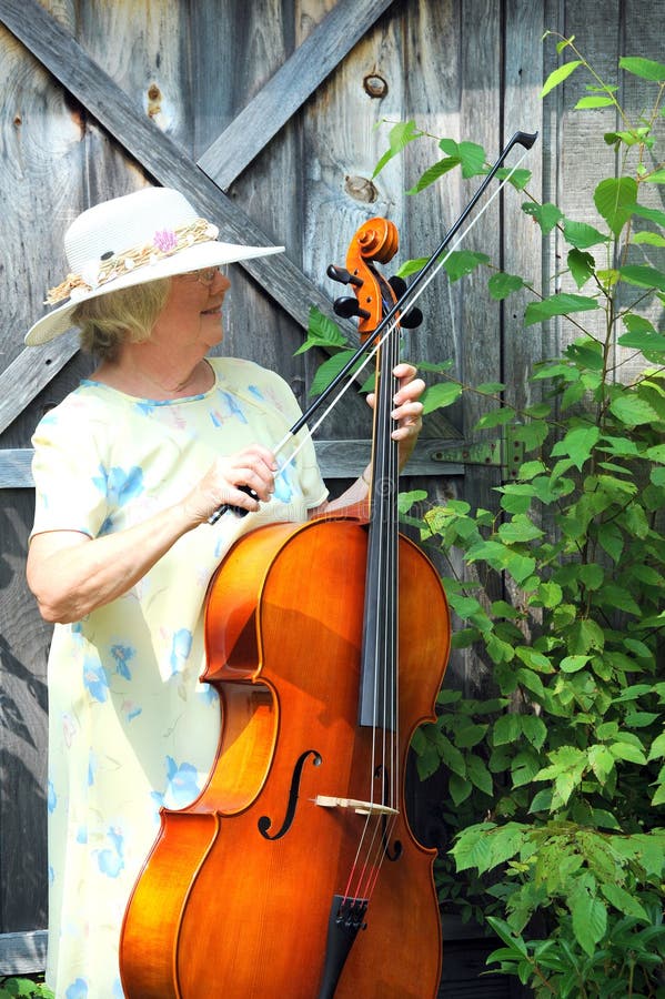 Female cellist. stock photo. Image of cellist, woman - 21105360