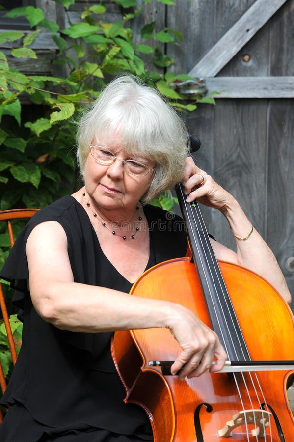 Female cellist stock image. Image of adult, instrumant - 21529011