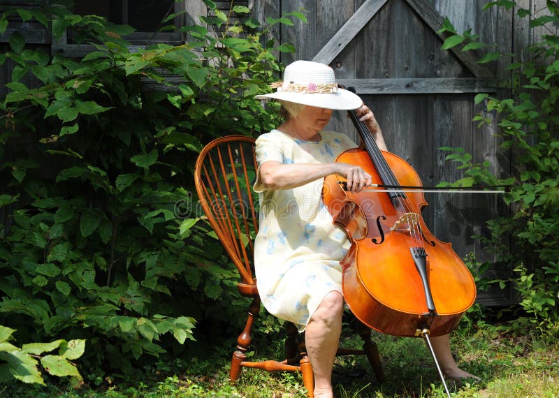 Female cellist. stock image. Image of mature, wooden - 54612281