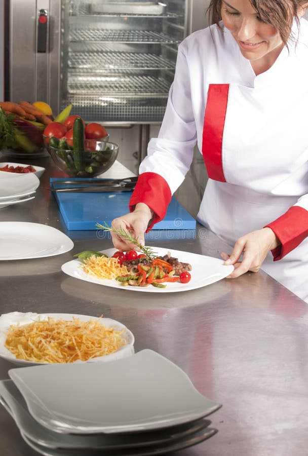 Female Chef in Restaurant Kitchen Cooking Stock Image - Image of adult ...