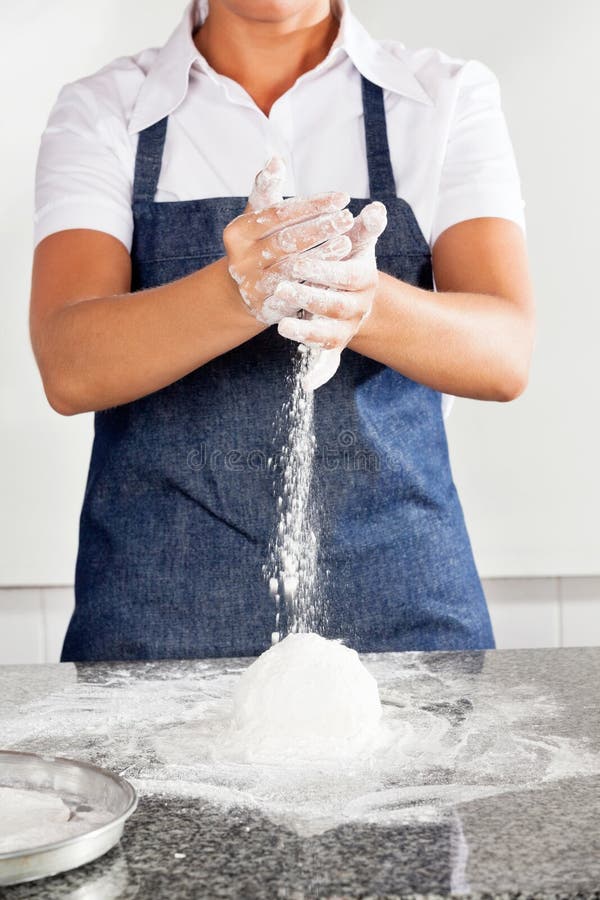 Female Chef Adding Flour To Dough Stock Image - Image of female ...