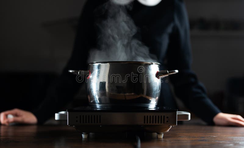Female chef cooking stock image. Image of metallic, steel - 376828395