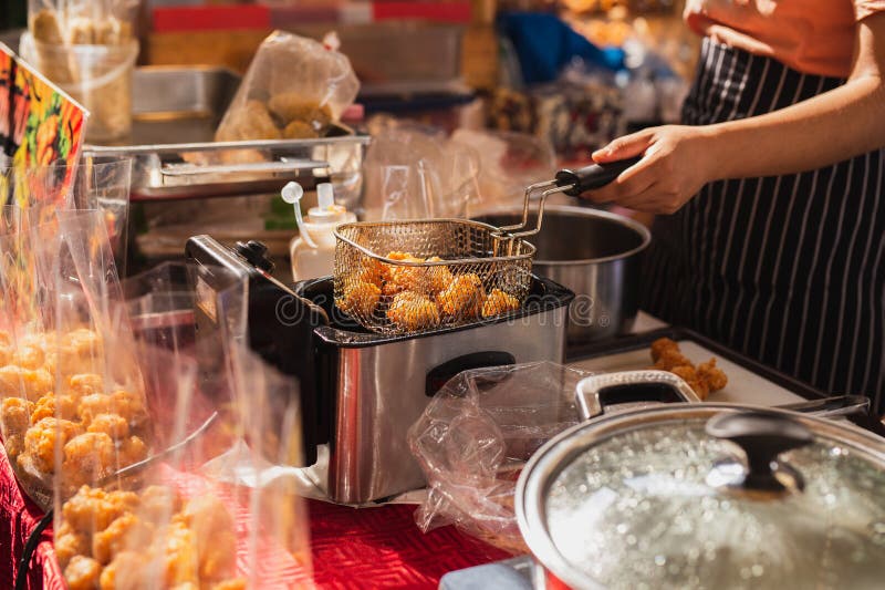 Female Chef Deep Fried Meat Ball in Kitchen. Stock Photo - Image of ...