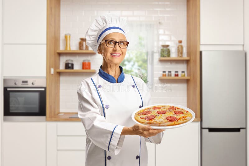 Female Chef Holding Pizza on a Plate Stock Image - Image of fridge ...