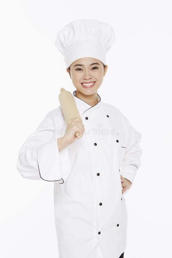 Female Chef Holding Up a Rolling Pin Stock Photo - Image of isolated ...
