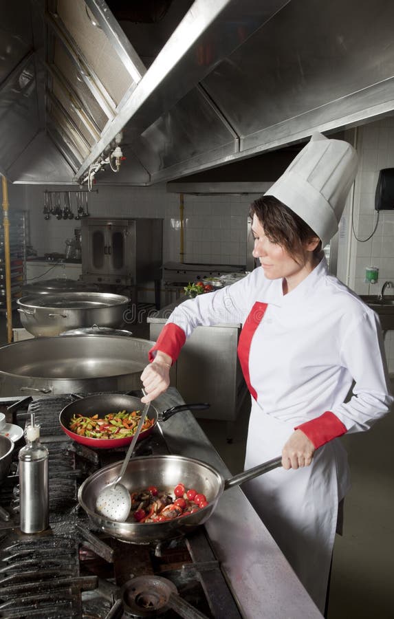 Female chef in kitchen stock photo. Image of happiness - 25994428