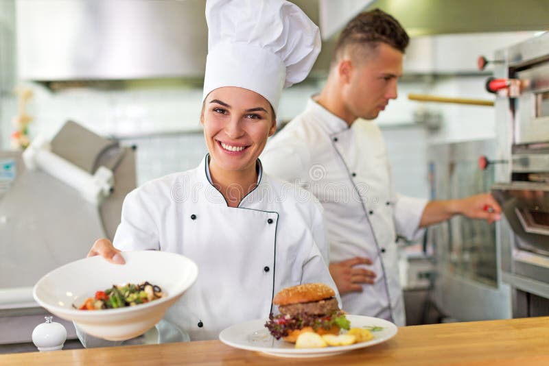 Chef in industrial kitchen stock photo. Image of meals - 6994748