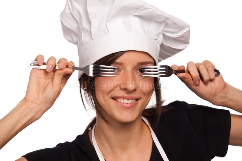 Female Chef Looking through Forks Stock Photo - Image of colorful ...