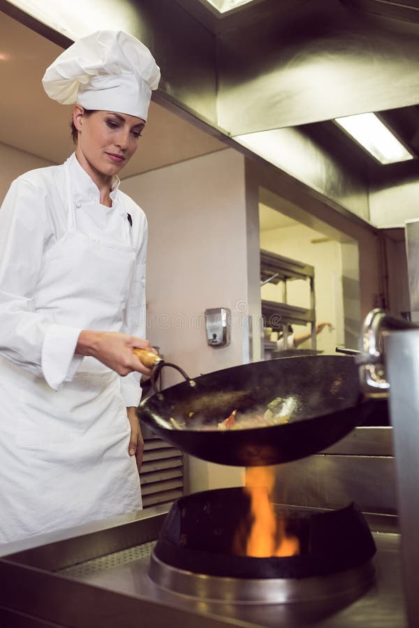 Female Chef Preparing Food in Kitchen Stock Image - Image of adult ...