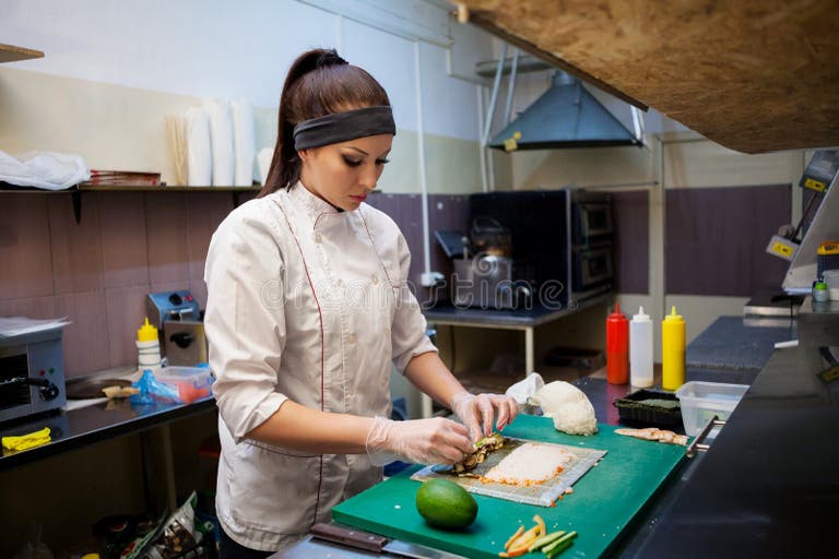Female Chef Preparing a Sushi Restaurant in the Kitchen Stock Image ...