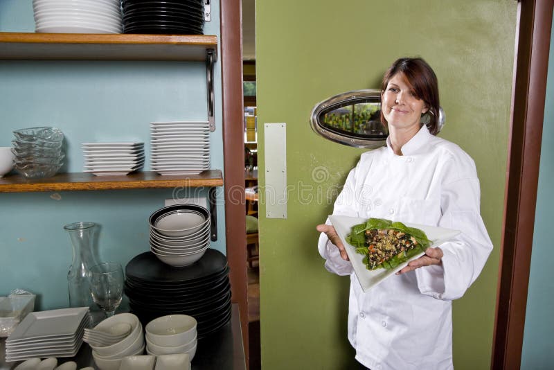 Female Chef in Restaurant with Salad Plate Stock Image - Image of dish ...